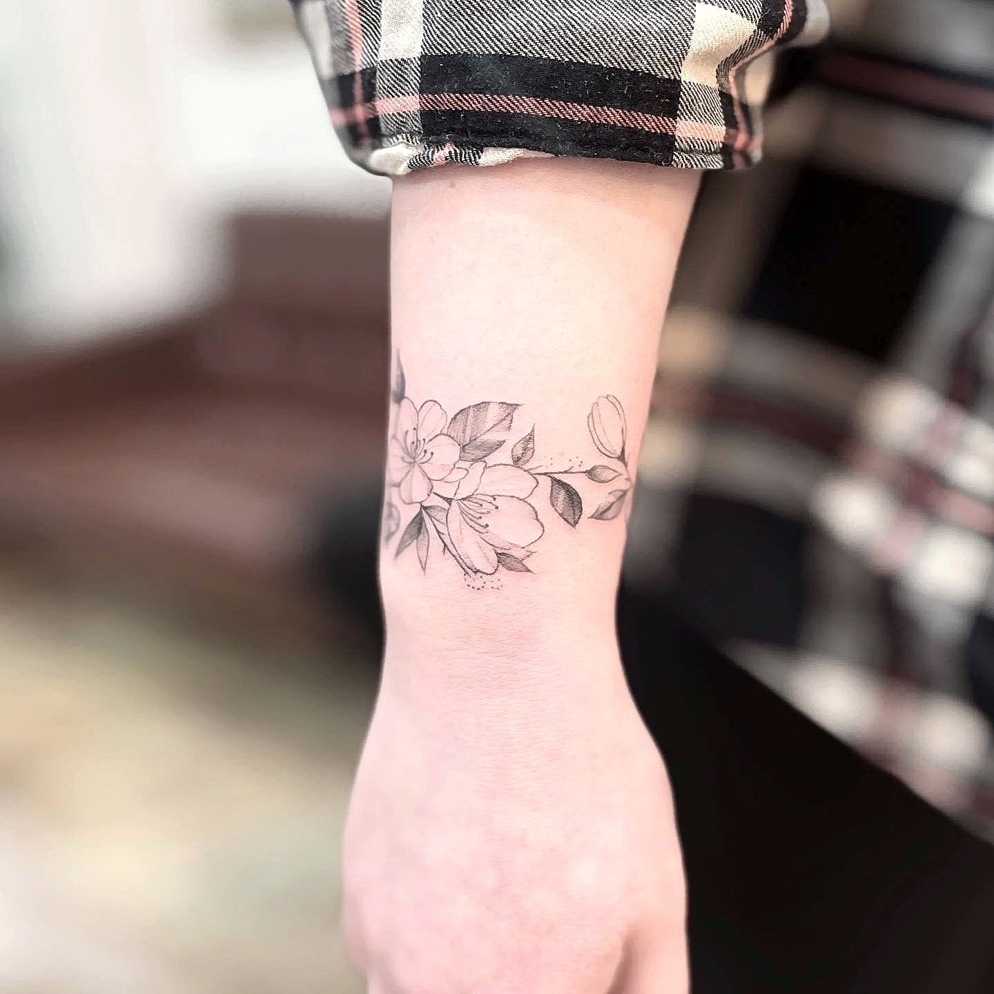 Fine Line Flower Bracelet Tattoo By Kawa - Iron Palm Tattoos & Body ...